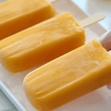 Home » Recipes » Desserts » Frozen Mango Popsicles